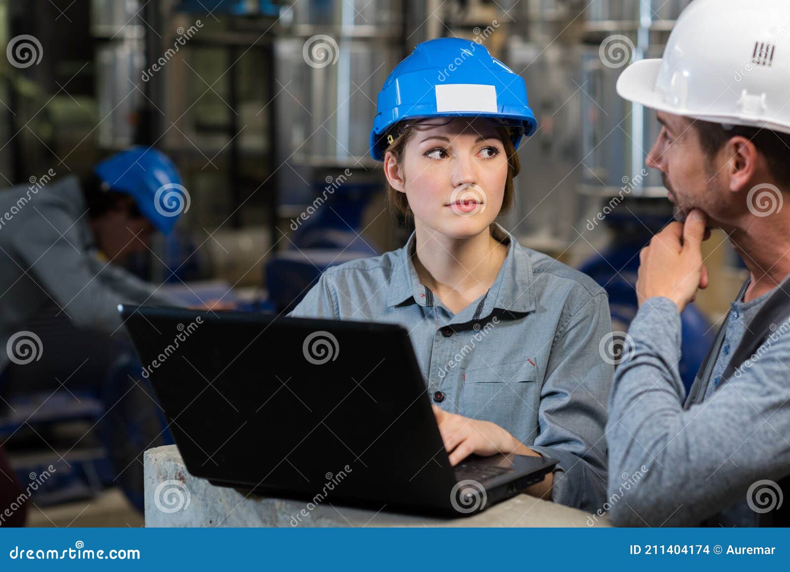 Industrial Factory Workers with Laptop and Hardhat on Stock Photo ...