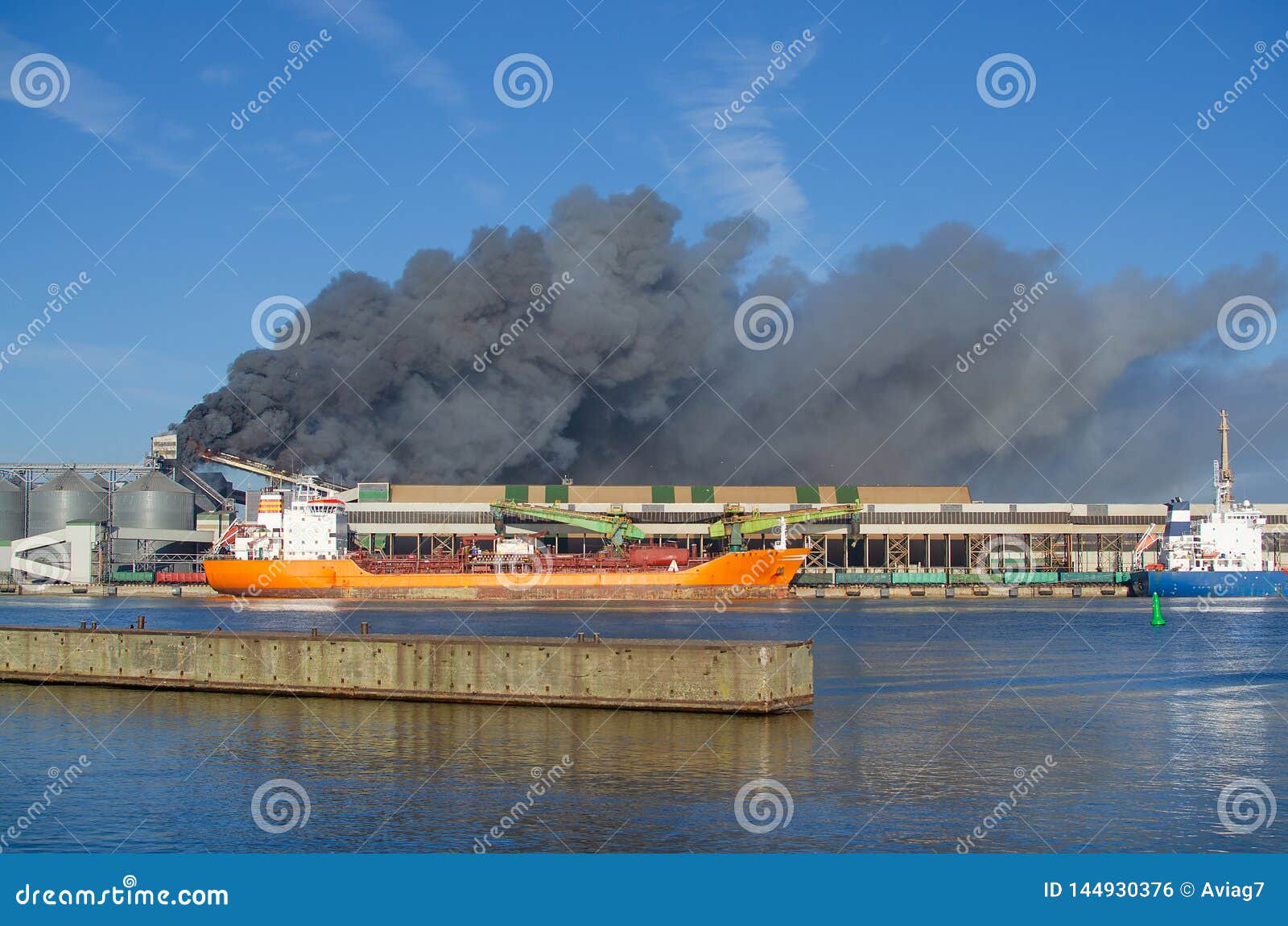 Industrial fire at port editorial photo. Image of dangerous - 144930376