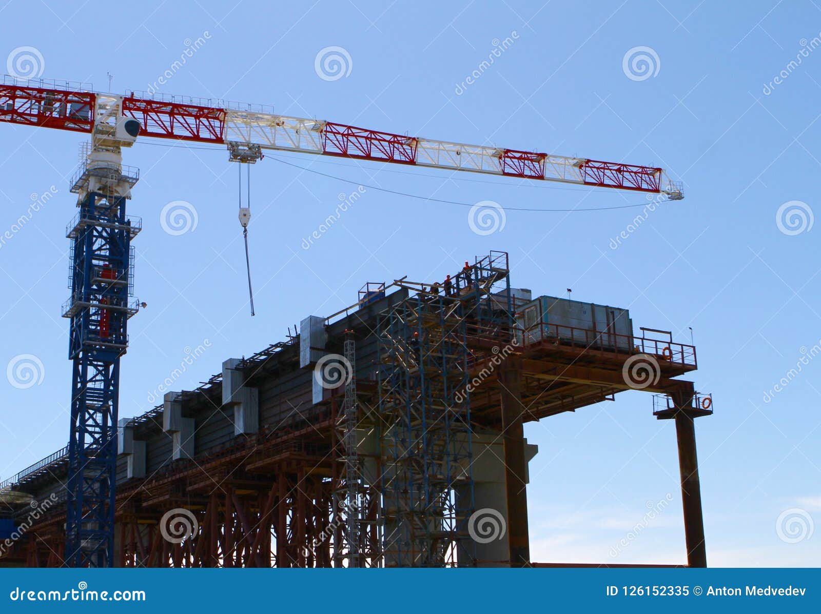 Industrial Image of Bridge Construction - Tall Crane on the ...