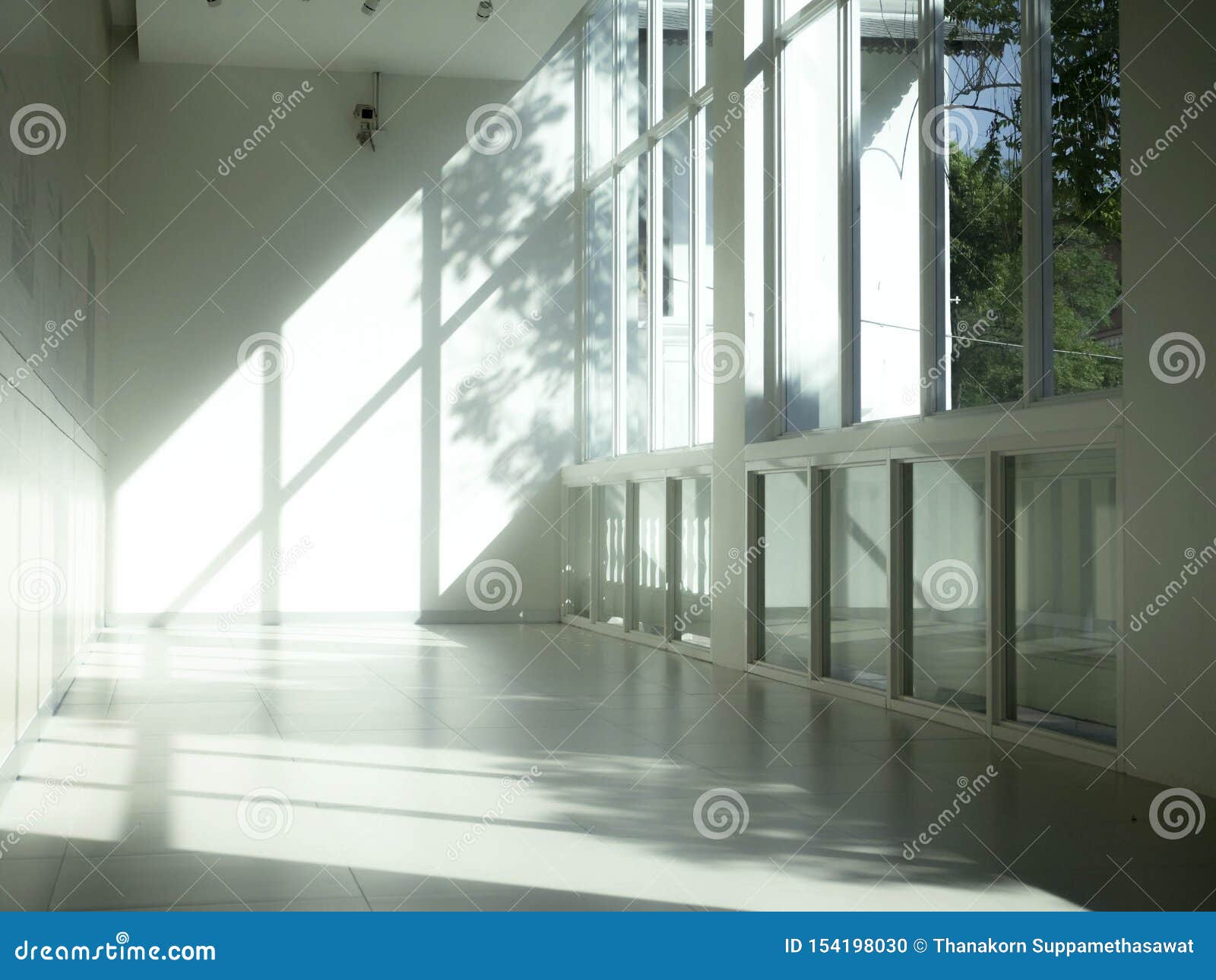 Industrial Interior with Bright Light Coming through Windows Stock ...