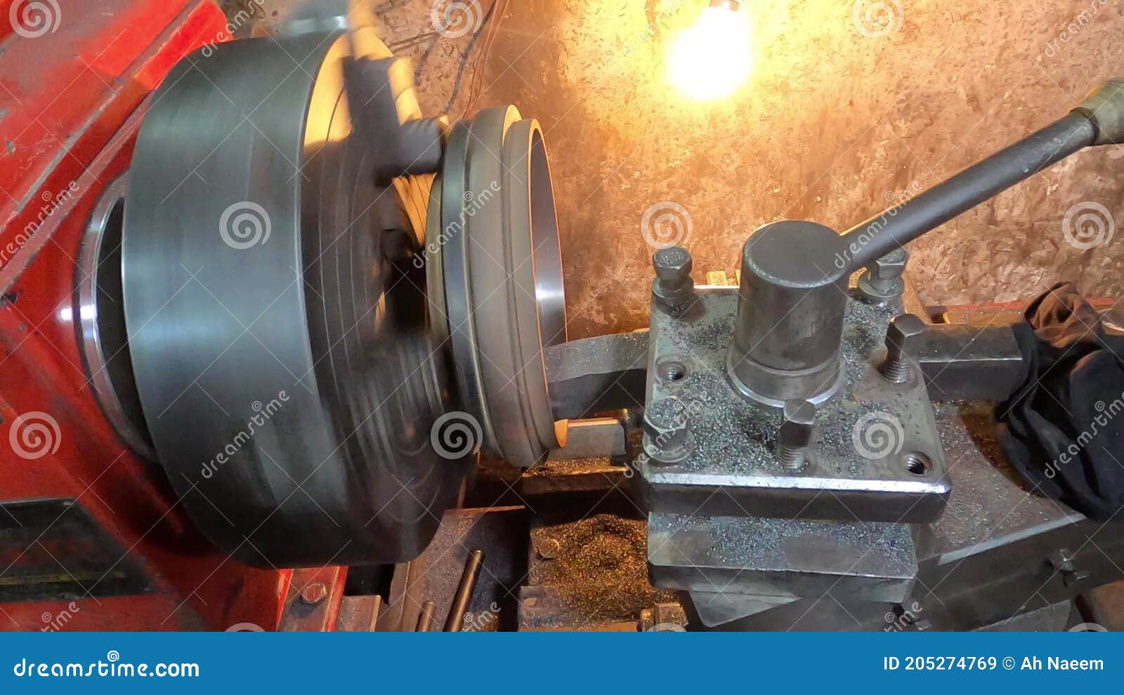 Industrial Lathe Heavy Machine Working Process in a Workshop at Night ...