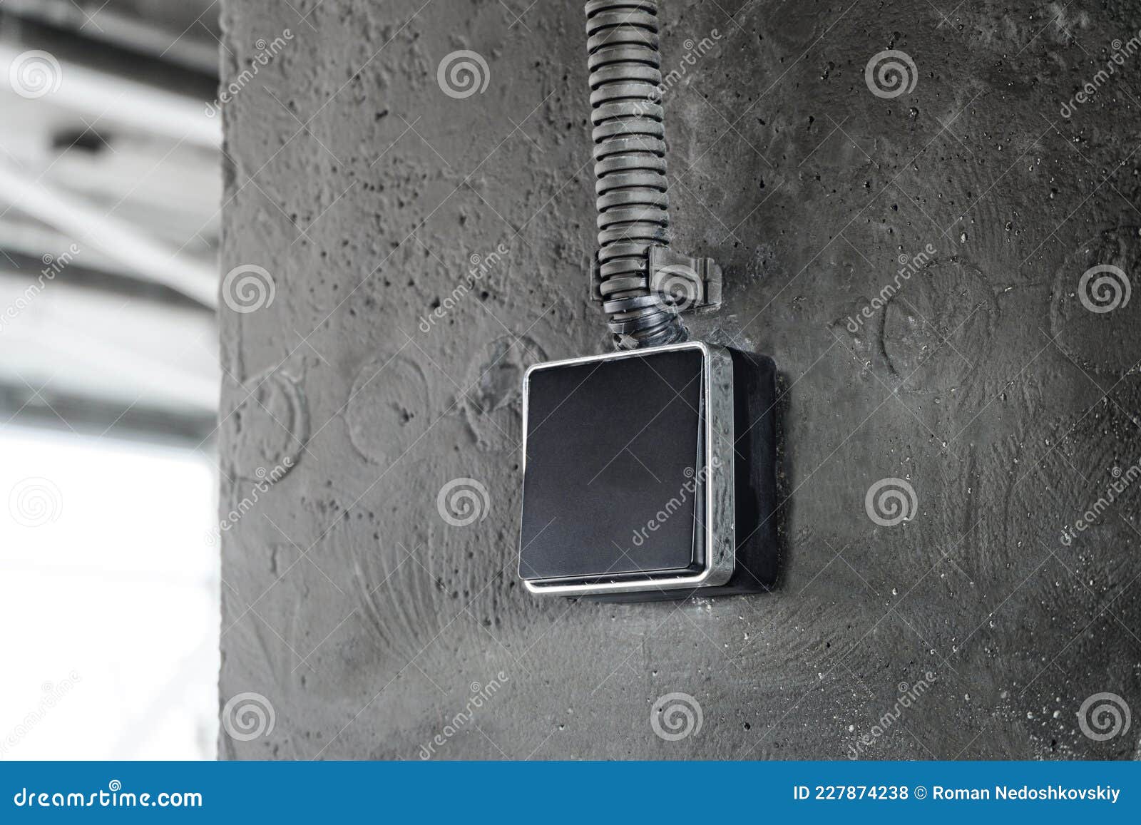 Industrial Light Switch Close-up. Black Button on Grey Surface Stock ...
