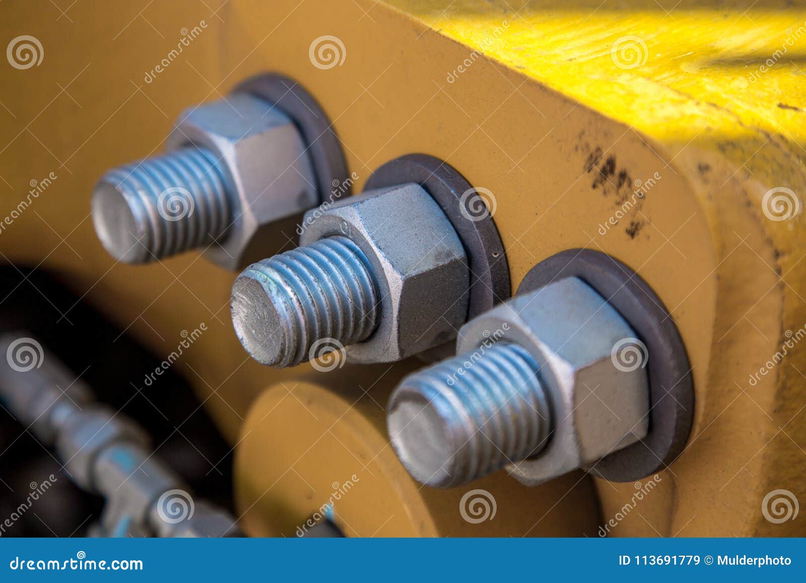 Machine Part Joint by Bolts and Nuts. Close-up View Stock Image - Image ...