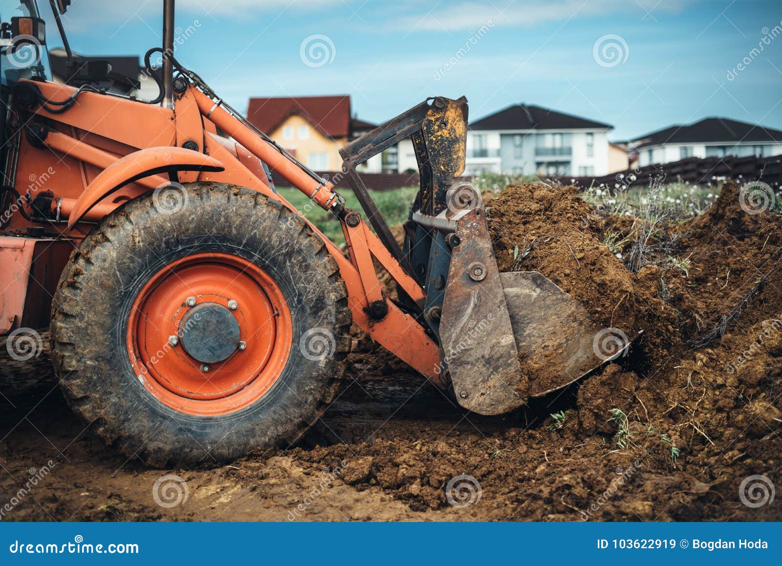 Industrial Machinery at Working Construction Site. Close Up of Backhoe ...