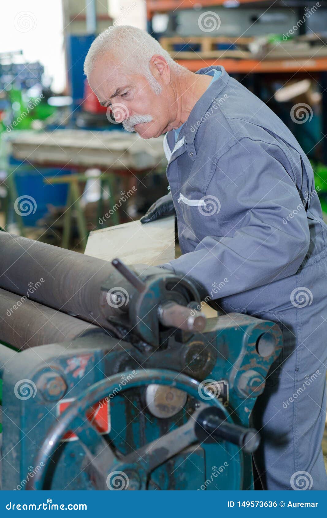 Industrial Man Worker Processing Sheet Metal in Factory Workshop Stock ...