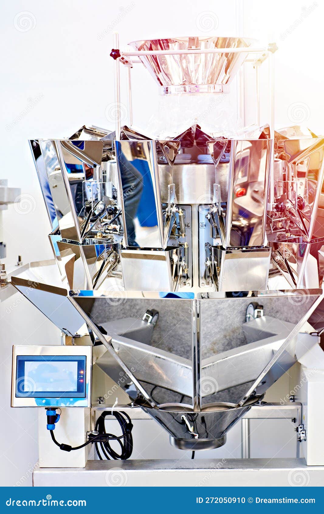 An Industrial Multihead Weighing Machine That Prepares Pea Portions For ...