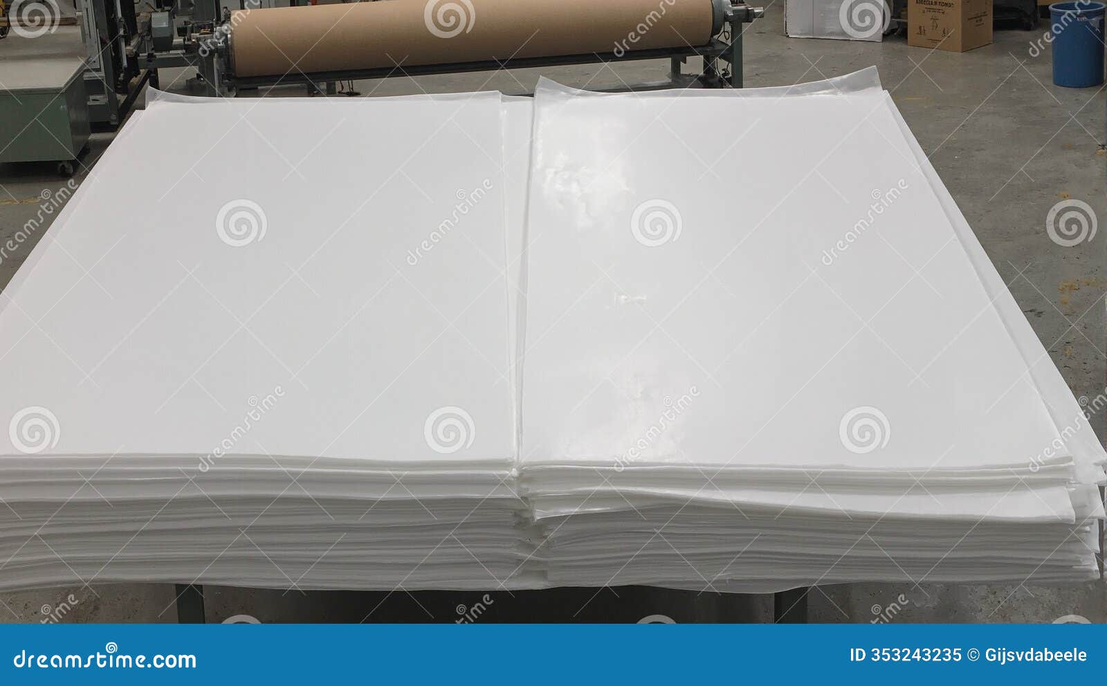 Industrial Plastic Sheets Neatly Stacked on Factory Floor with Rolls ...