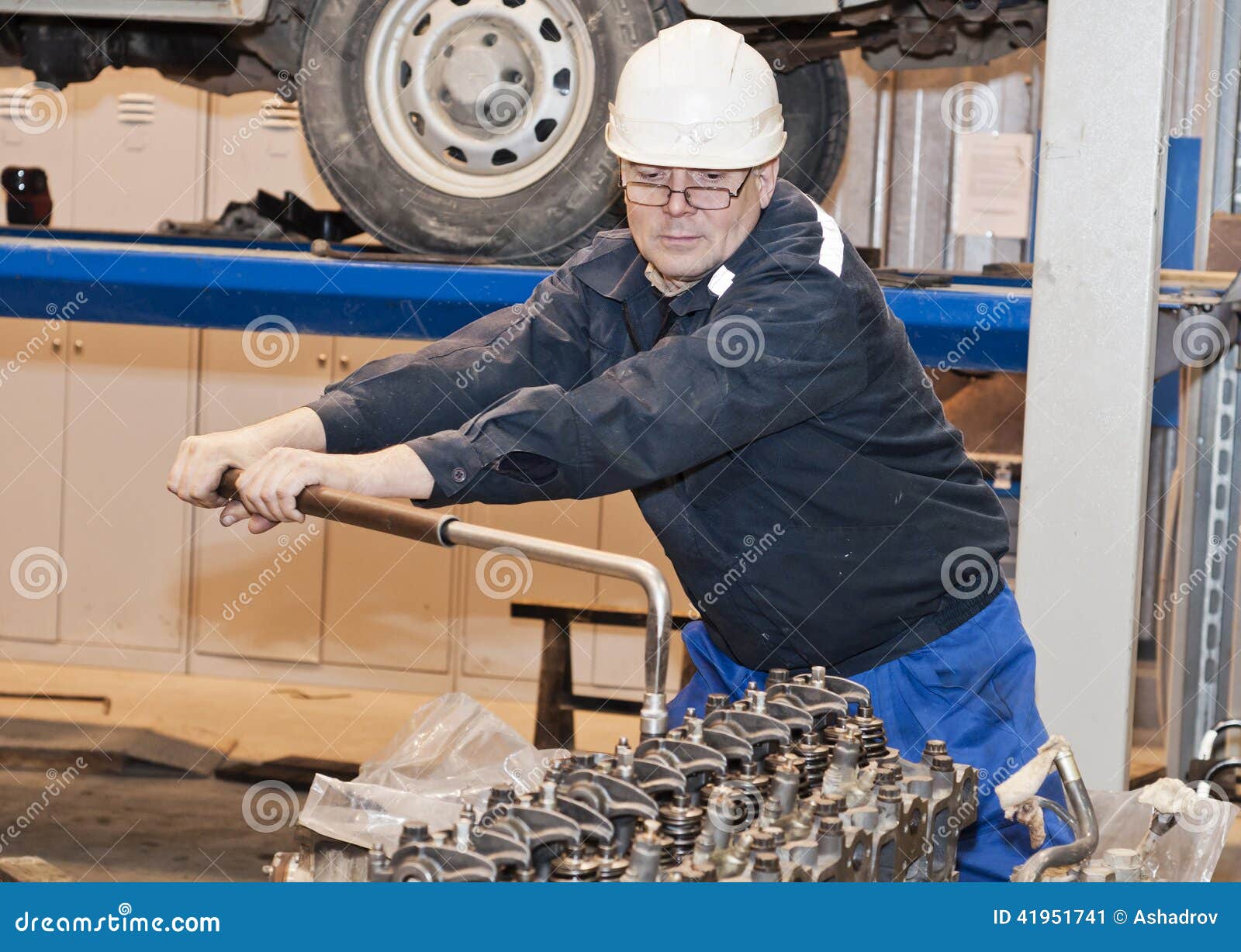 Industrial Platform. the Mechanic Repairs the Engine Stock Image ...