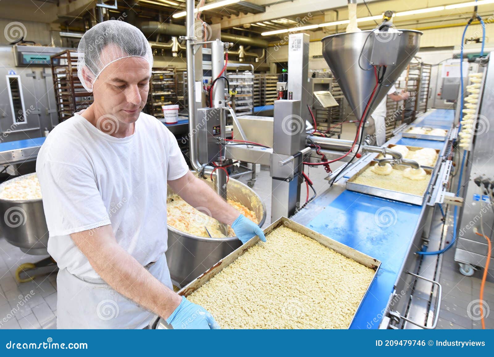 Industrial Production of Cakes and Tarts in a Large Bakery on an ...