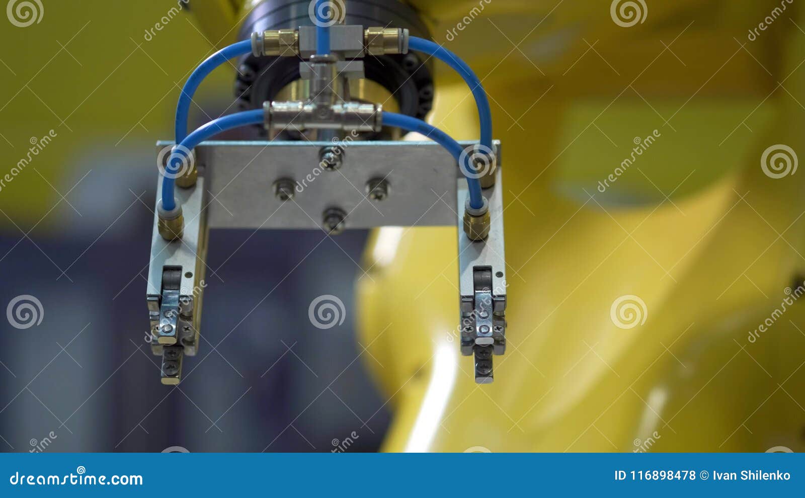 Industrial Robot Manipulator Yellow Color Performs Movements that are ...