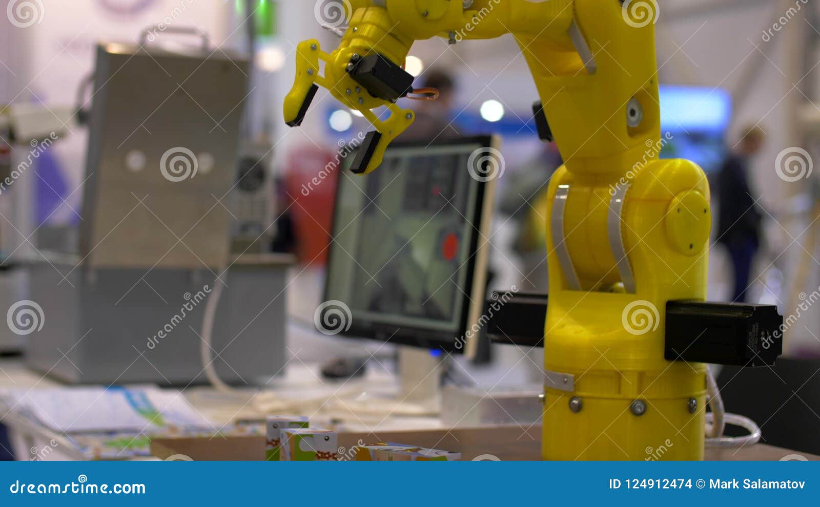 Industrial Robot Manipulator Yellow Color Performs Movements that are ...