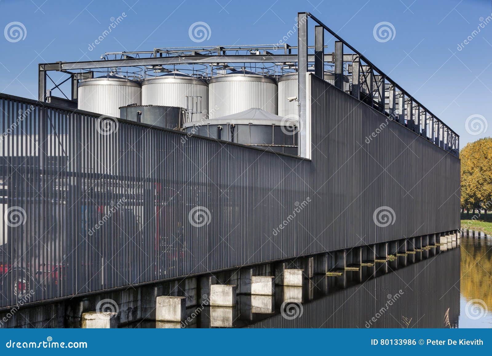 Industrial Security Fence and Storage Tanks Stock Photo - Image of ...