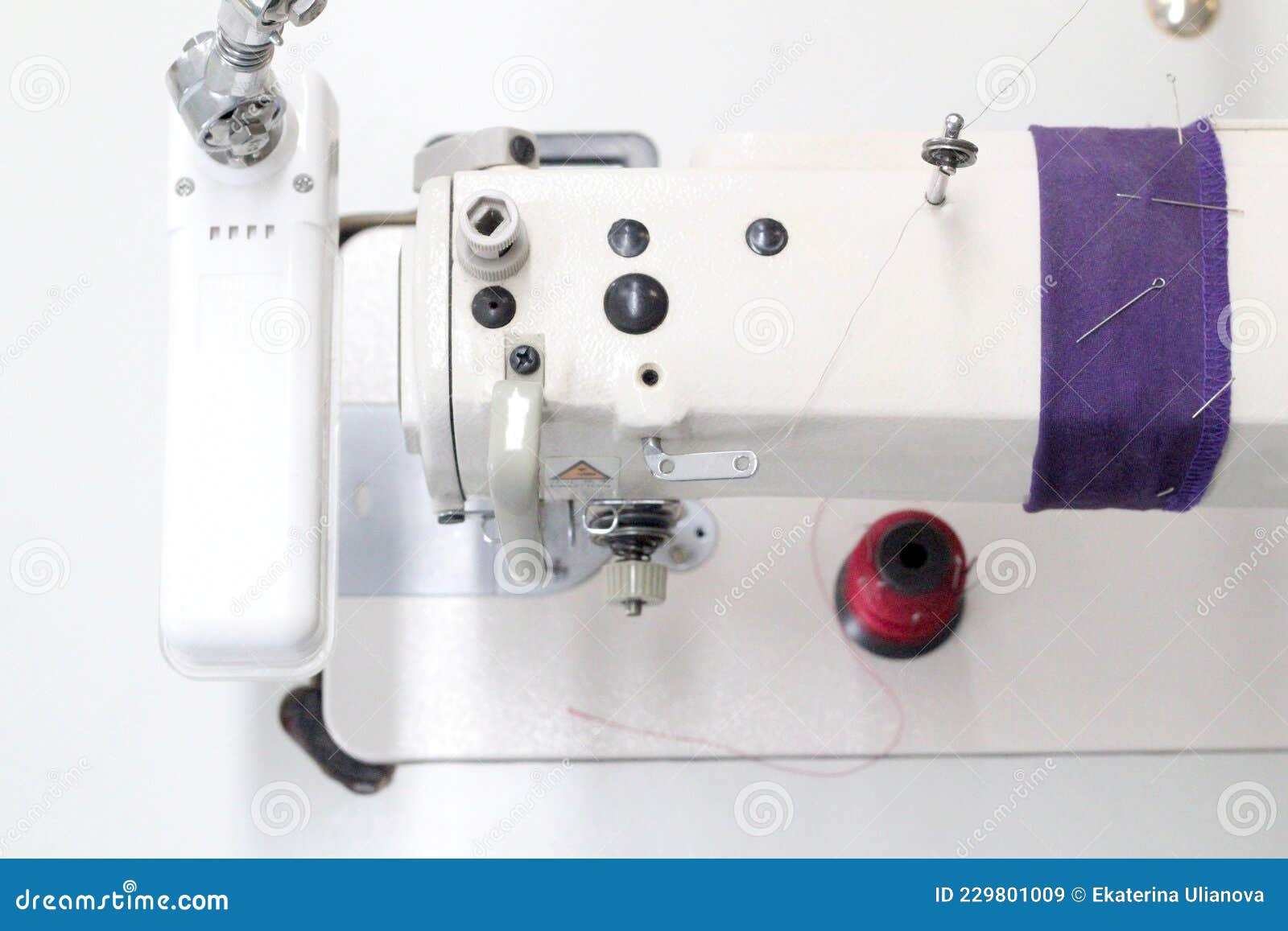 Industrial Sewing Machine, Top View. There is a Lamp on the Side. There ...