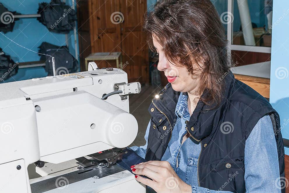Industrial Sewing Machines with Sewing Machine Operator Stock Image ...
