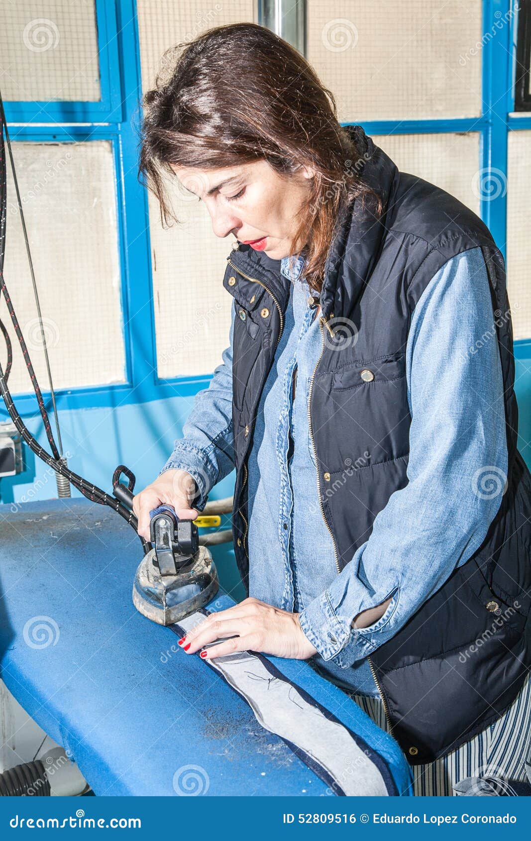 Industrial Sewing Machines with Sewing Machine Operator Stock Photo ...