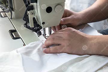 Industrial Sewing Machines with Sewing Machine Operator Stock Photo ...