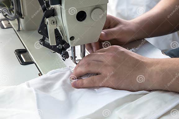 Industrial Sewing Machines with Sewing Machine Operator Stock Photo ...
