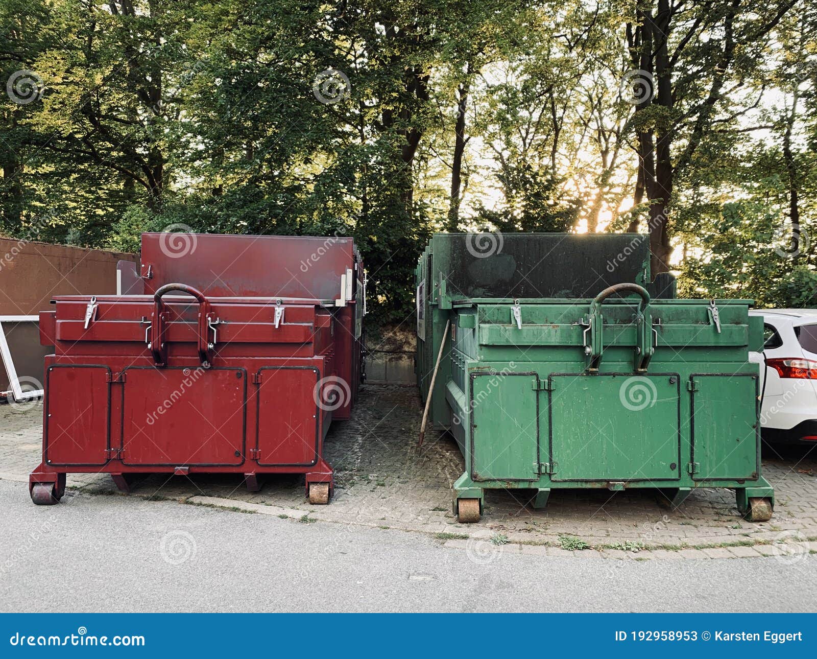 On Industrial Site a Green Waste Compactor and a Red Waste Compactor ...