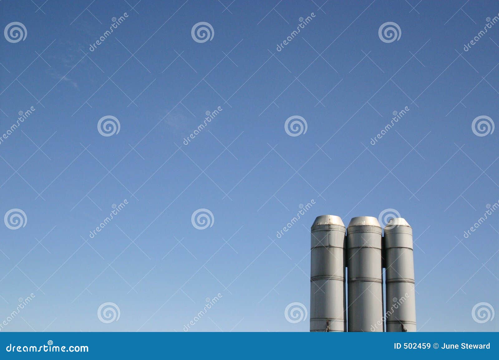 Industrial Stacks Blue Sky stock image. Image of energy - 502459