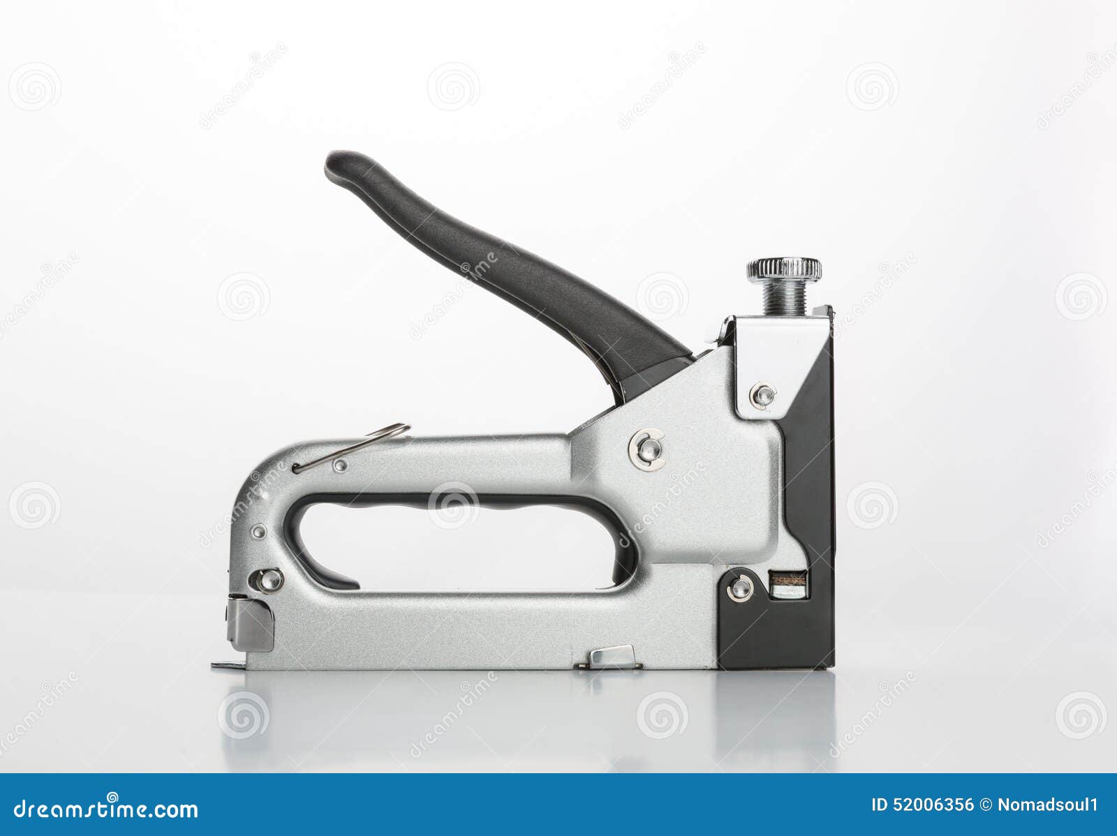 Industrial Stapler In A Man`s Hand. The Man Holds The Stapler And Holds ...