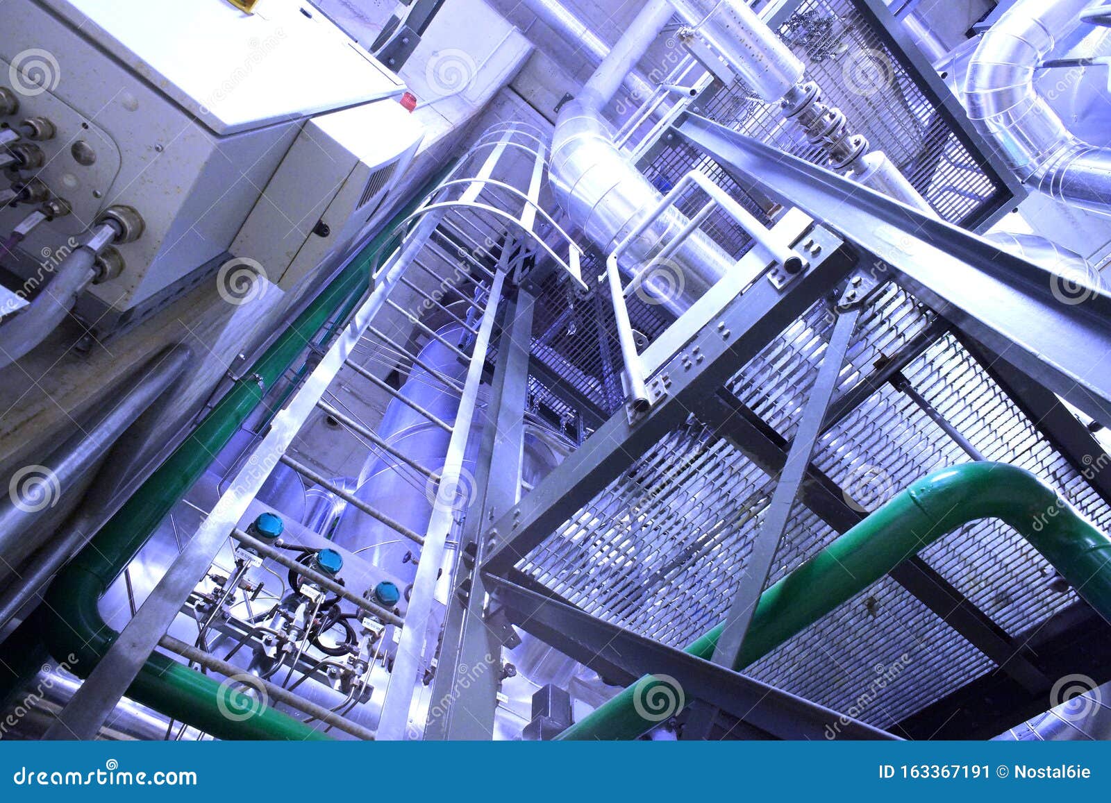 Industrial Steel Pipelines, Valves, Cables and Walkways Stock Image ...