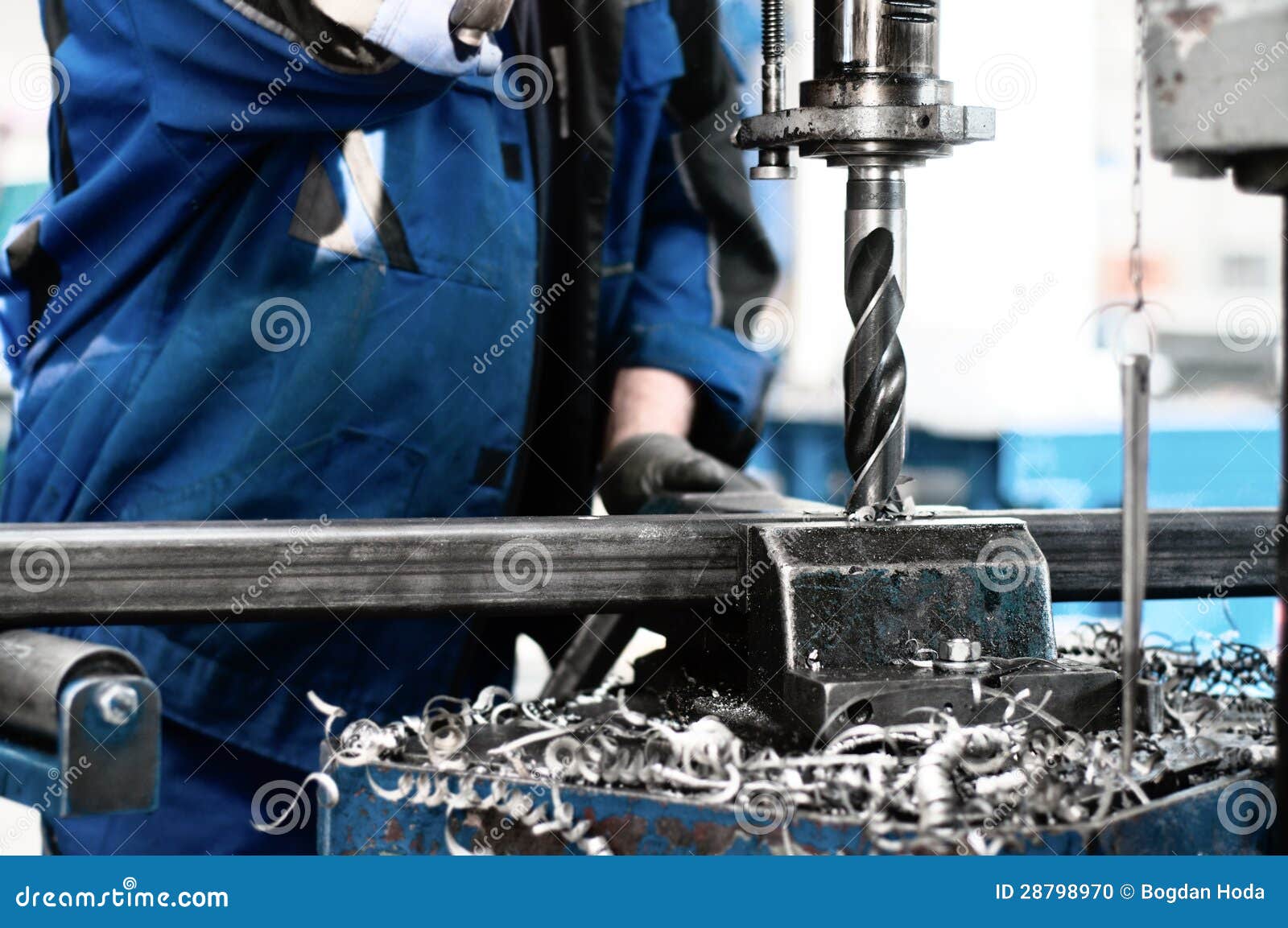 Industrial Tehnician Working on a Drilling Machine Stock Photo - Image ...