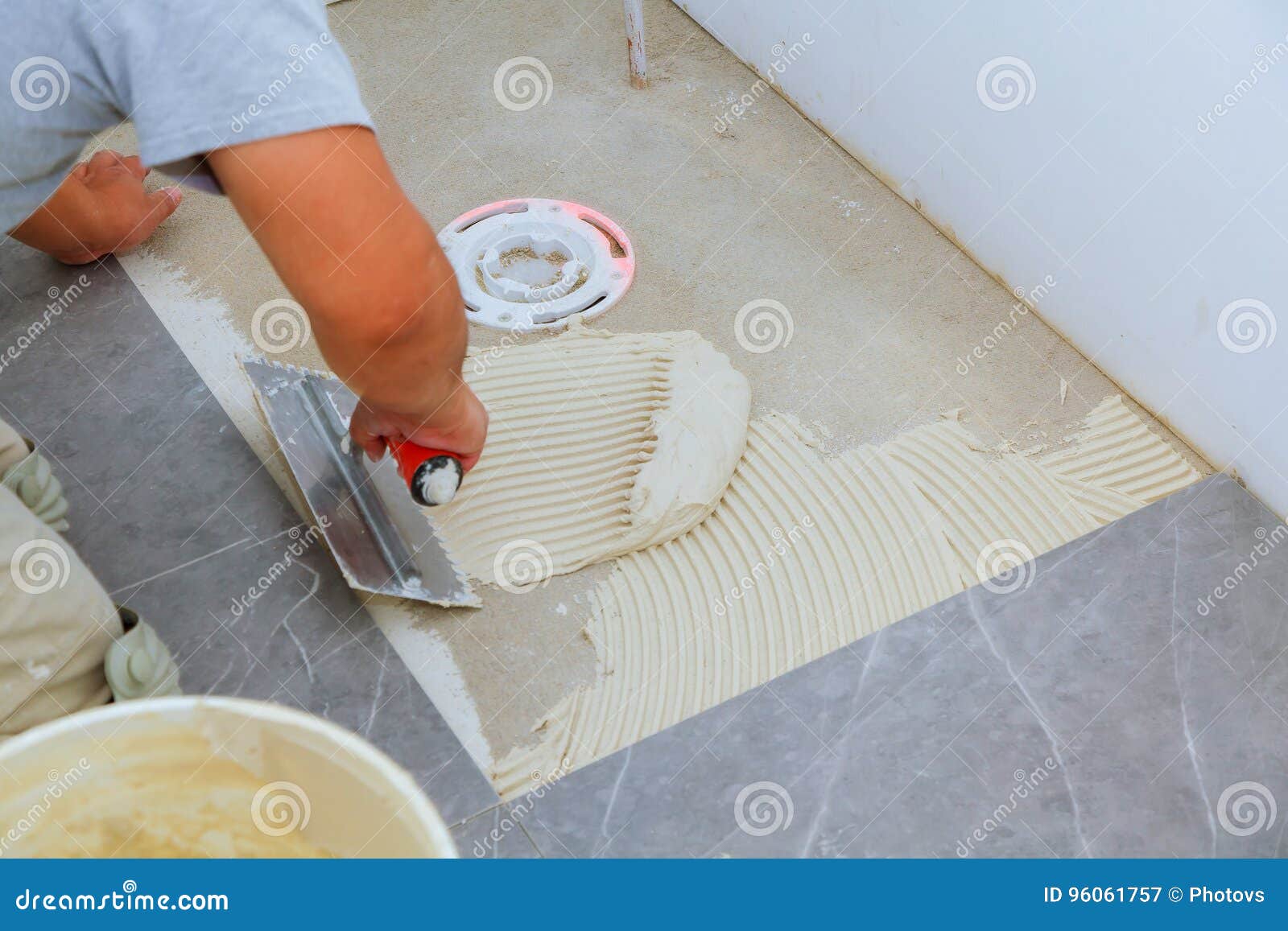 Industrial Tiler Builder Worker Installing Floor Tile Stock Image ...