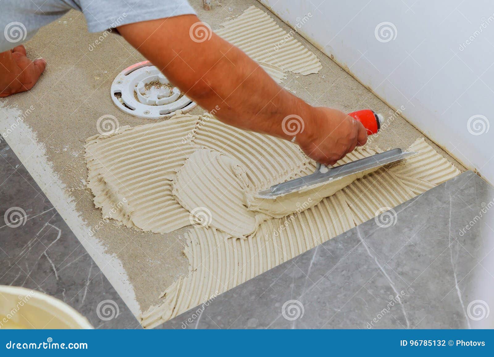 Industrial Tiler Builder Worker Installing Floor Tile Stock Photo ...