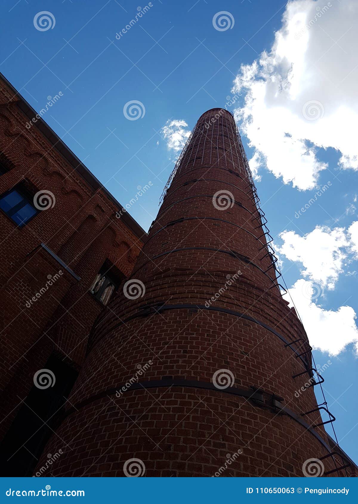Tower of former factory stock image. Image of industrial - 110650063