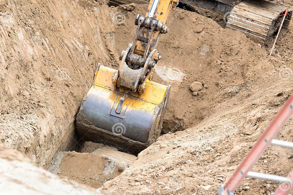 Industrial Tractor Digging at a Construction Site. Stock Image - Image ...