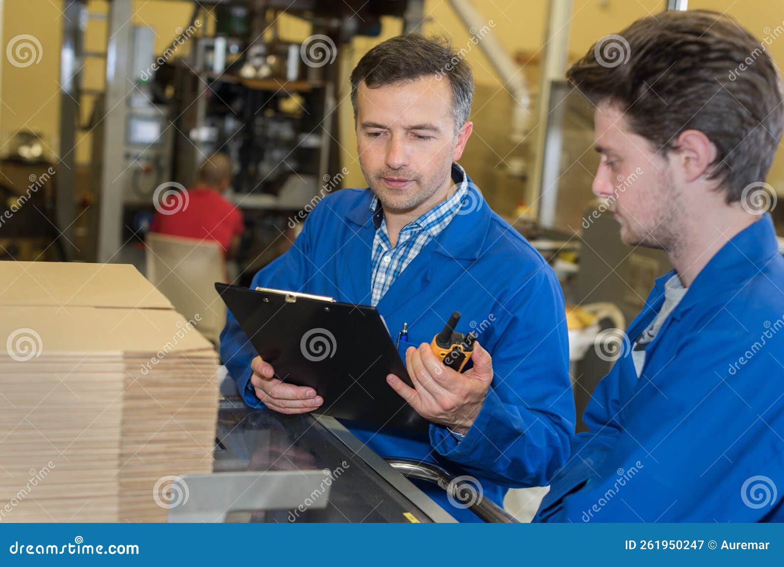 Industrial Trainer at Work with Trainee Stock Image - Image of ...