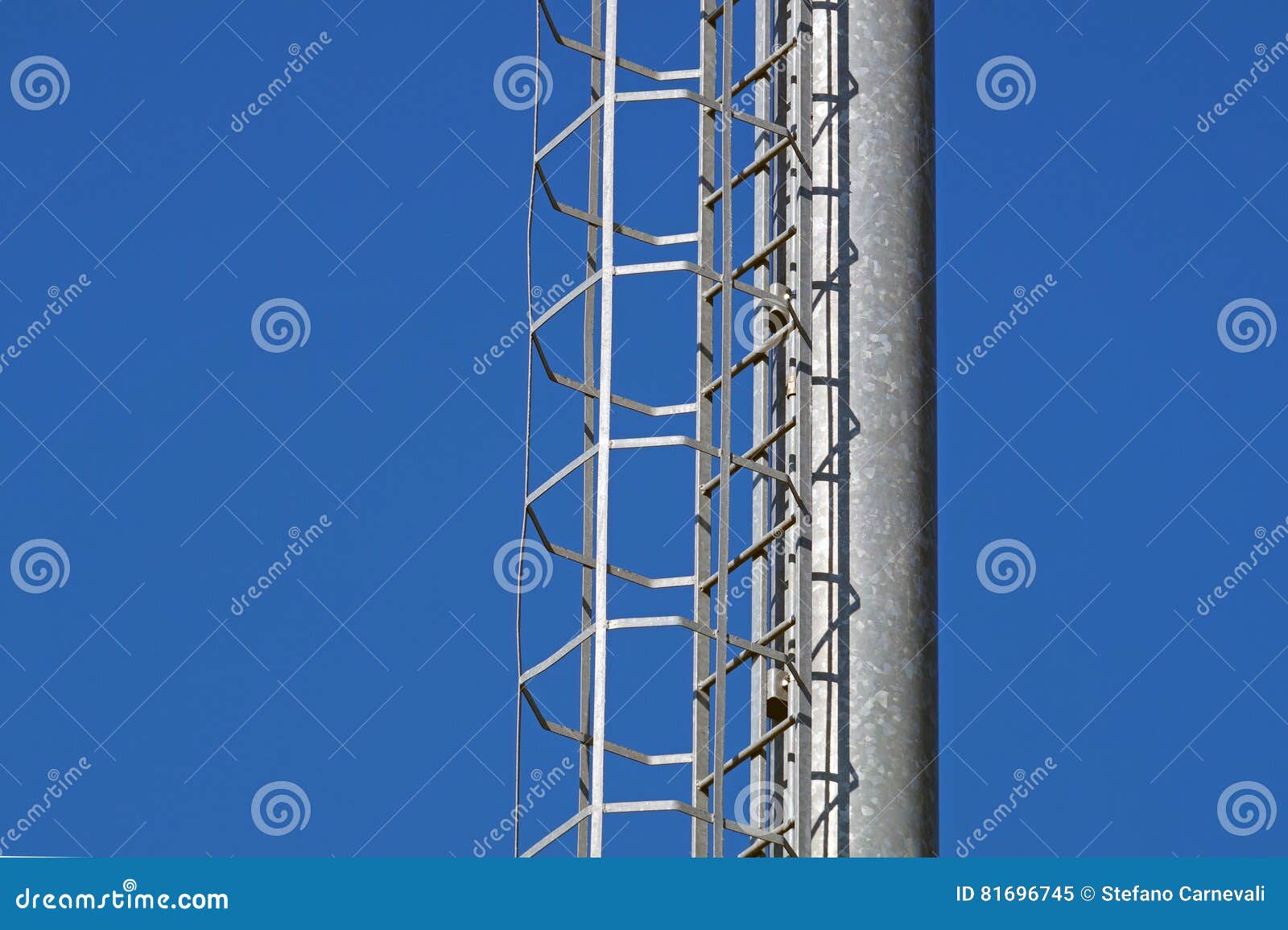 Industrial Vertical Stairs with Blue Sky Background in High Contrast ...