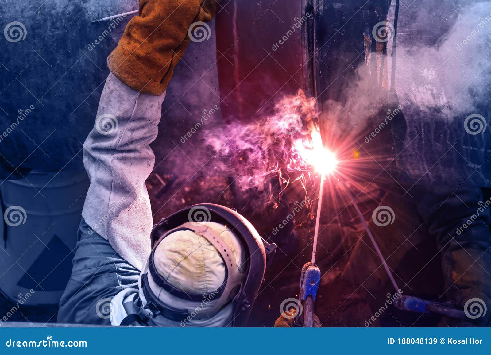 Industrial Welding, Worker with Protective Mask Welding Bore Pile Metal ...