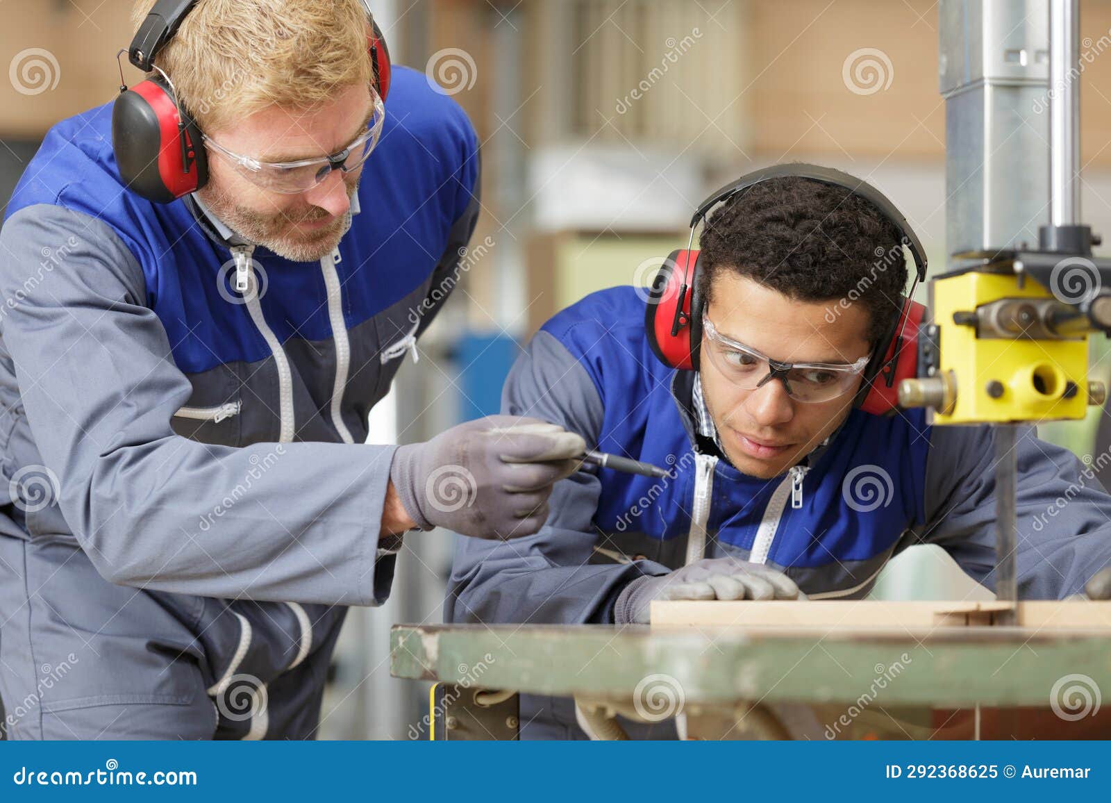 Industrial Woodworker Apprentice Using Bandsaw Stock Image - Image of ...