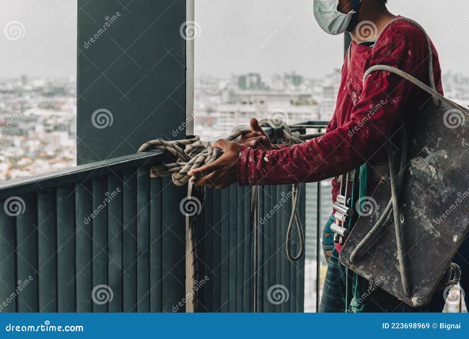 Industrial Worker Adjusting Climbing Gear Preparing Safety Rope. Stock ...