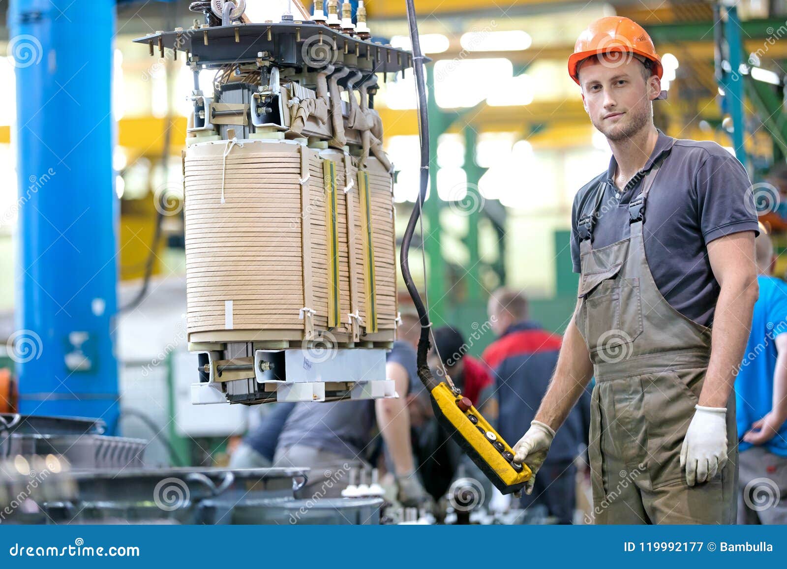 Industrial Worker Assembling Power Transformer at Conveyor Factory ...