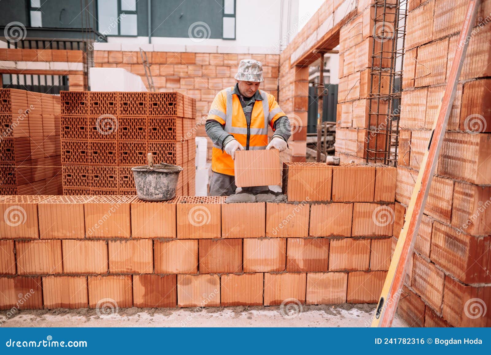 Industrial Worker, Bricklayer, Mason Working with Bricks Stock Photo ...