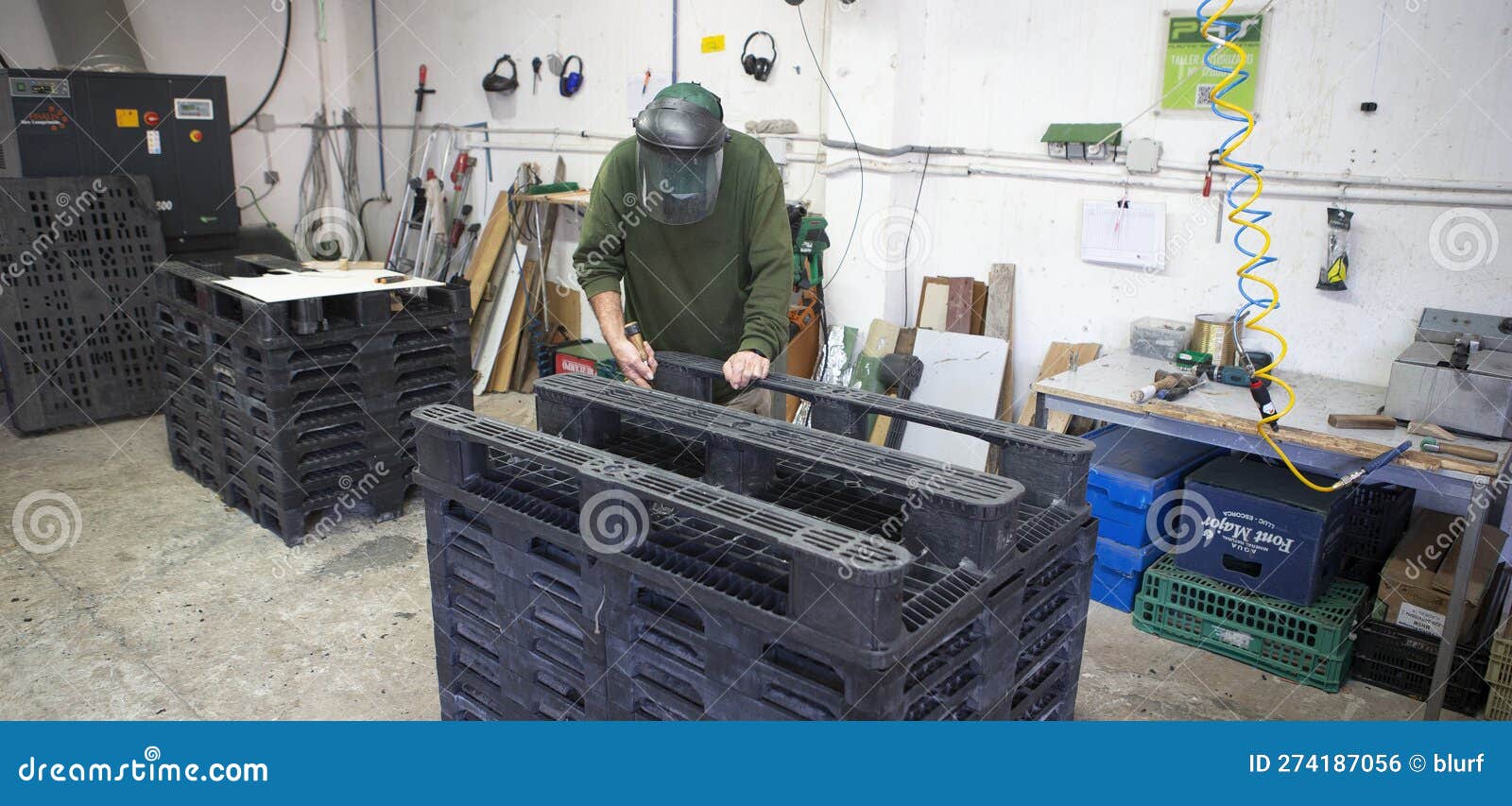 Industrial Worker at Soldering Work in a Warehouse Editorial Photo ...