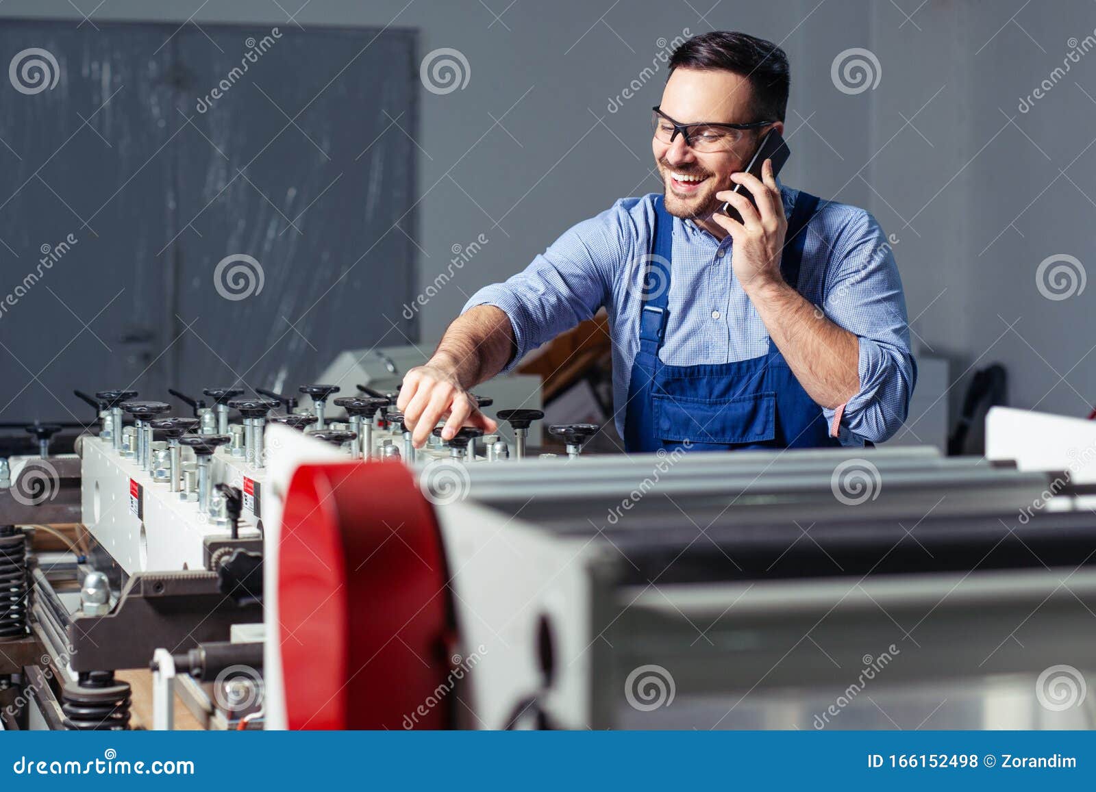 Industrial Worker Talking on Cell Phone. Stock Photo - Image of site ...