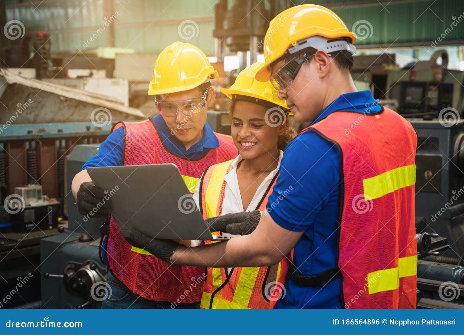 The Industrial Worker Team is Working on Various Projects in a Large ...