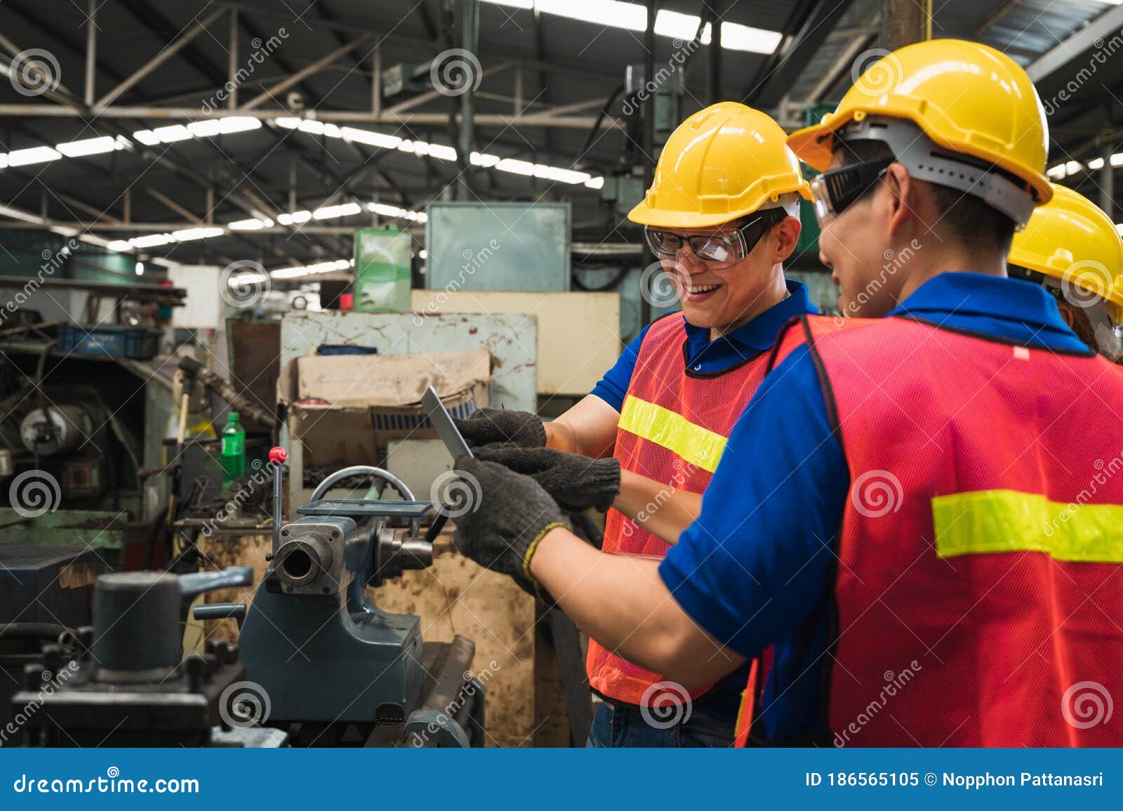 The Industrial Worker Team is Working on Various Projects in a Large ...