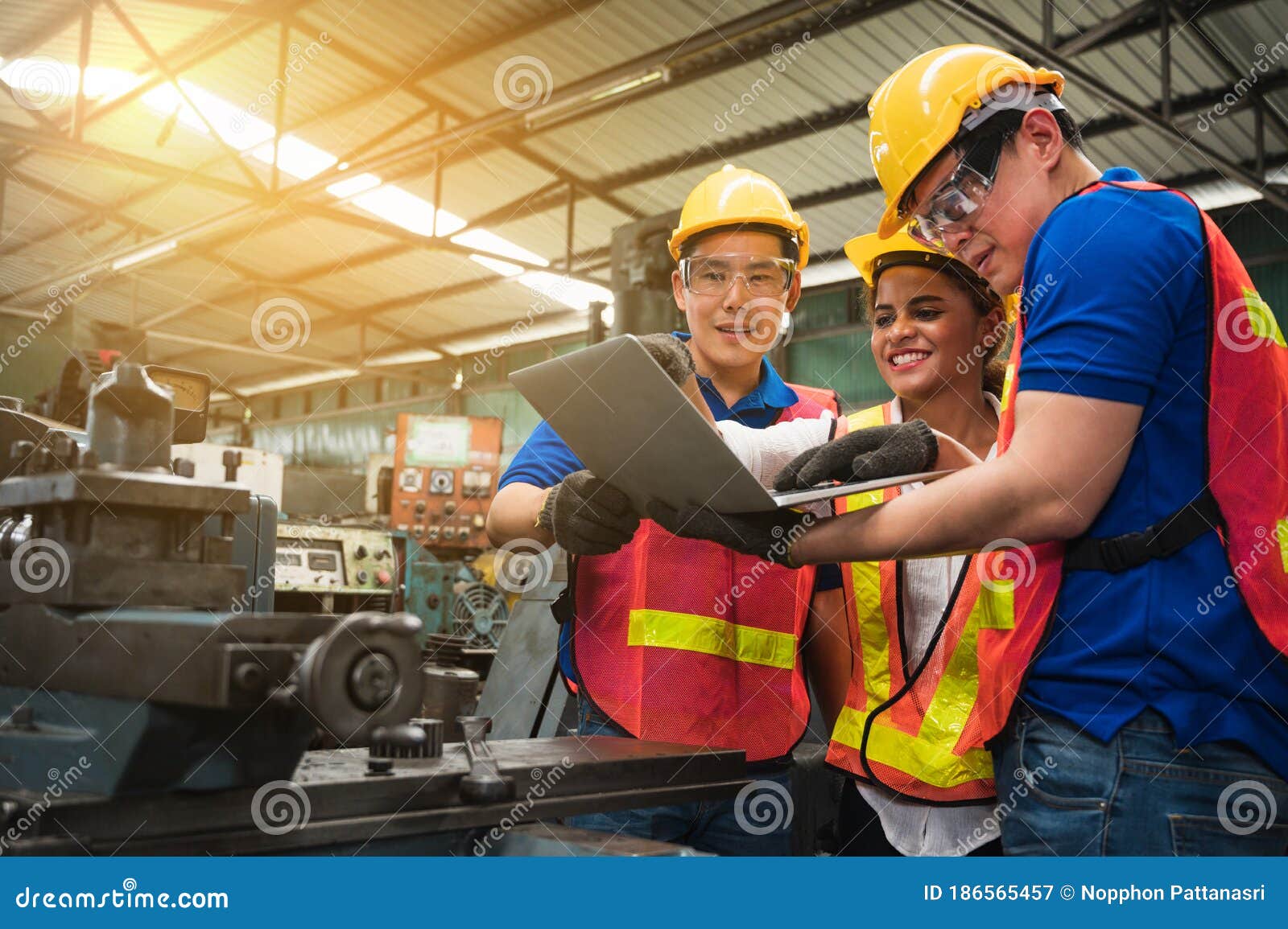 The Industrial Worker Team is Working on Various Projects in a Large ...