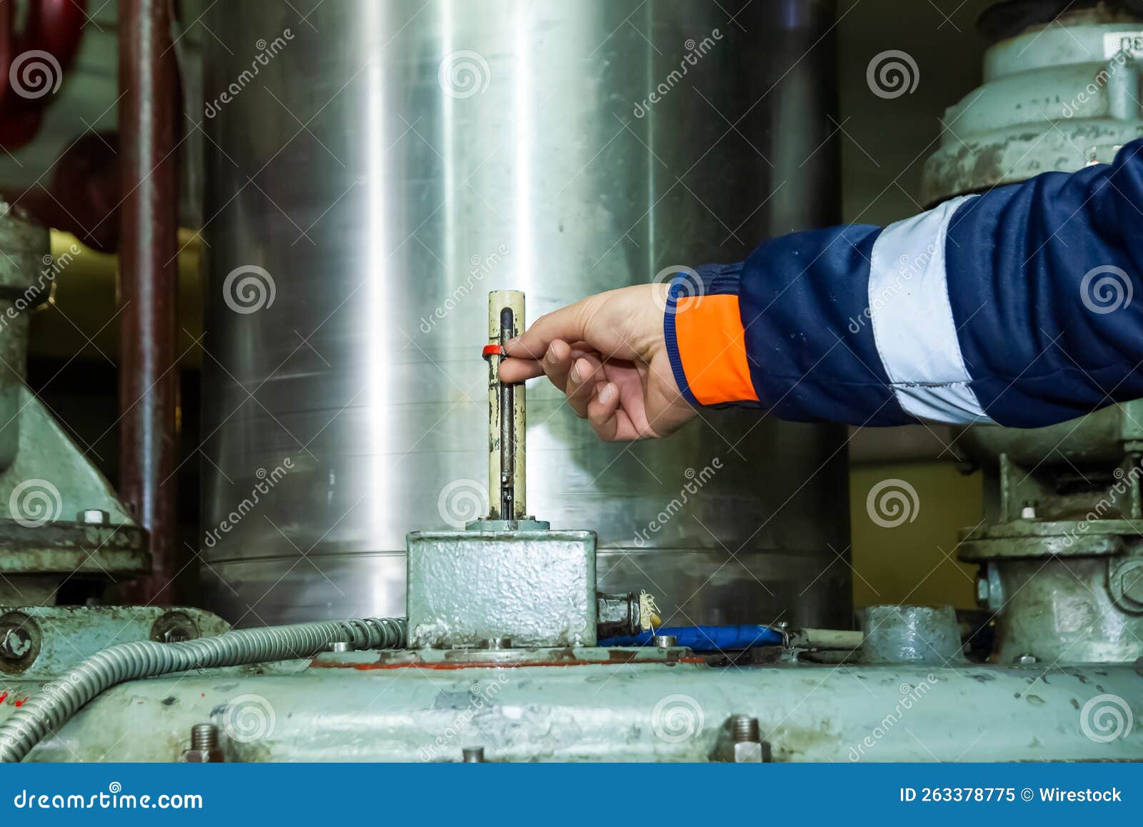 Industrial Worker Touching Tool at Work in Factory Stock Image - Image ...