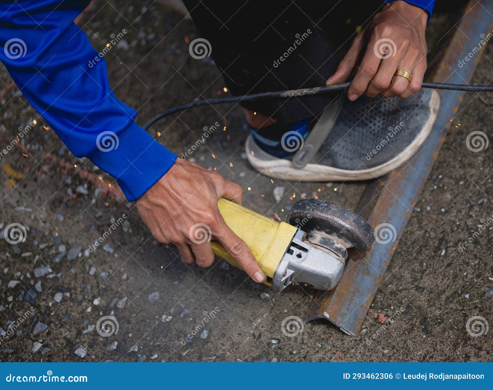 Industrial Worker Using Angle Grinder and Cutting a Metal Stock Photo ...