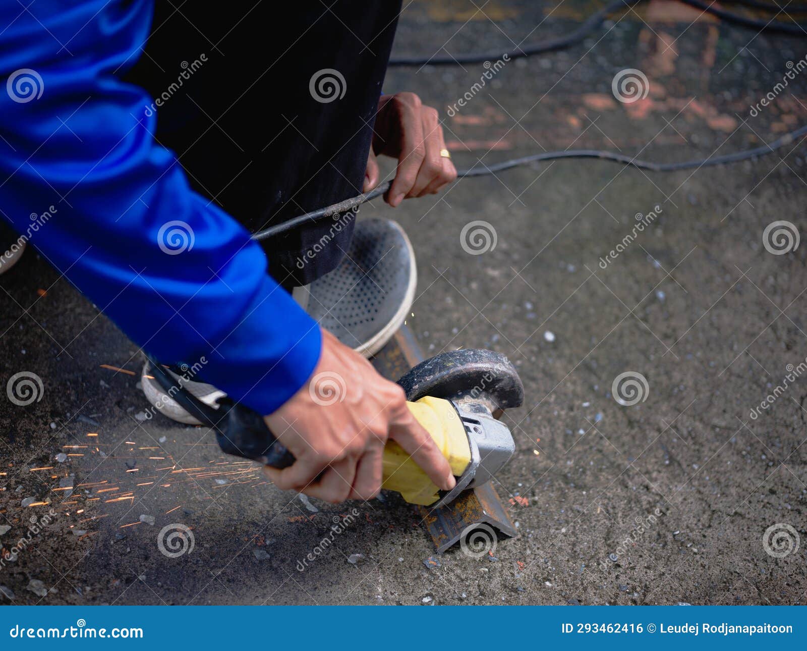 Industrial Worker Using Angle Grinder and Cutting a Metal Stock Photo ...