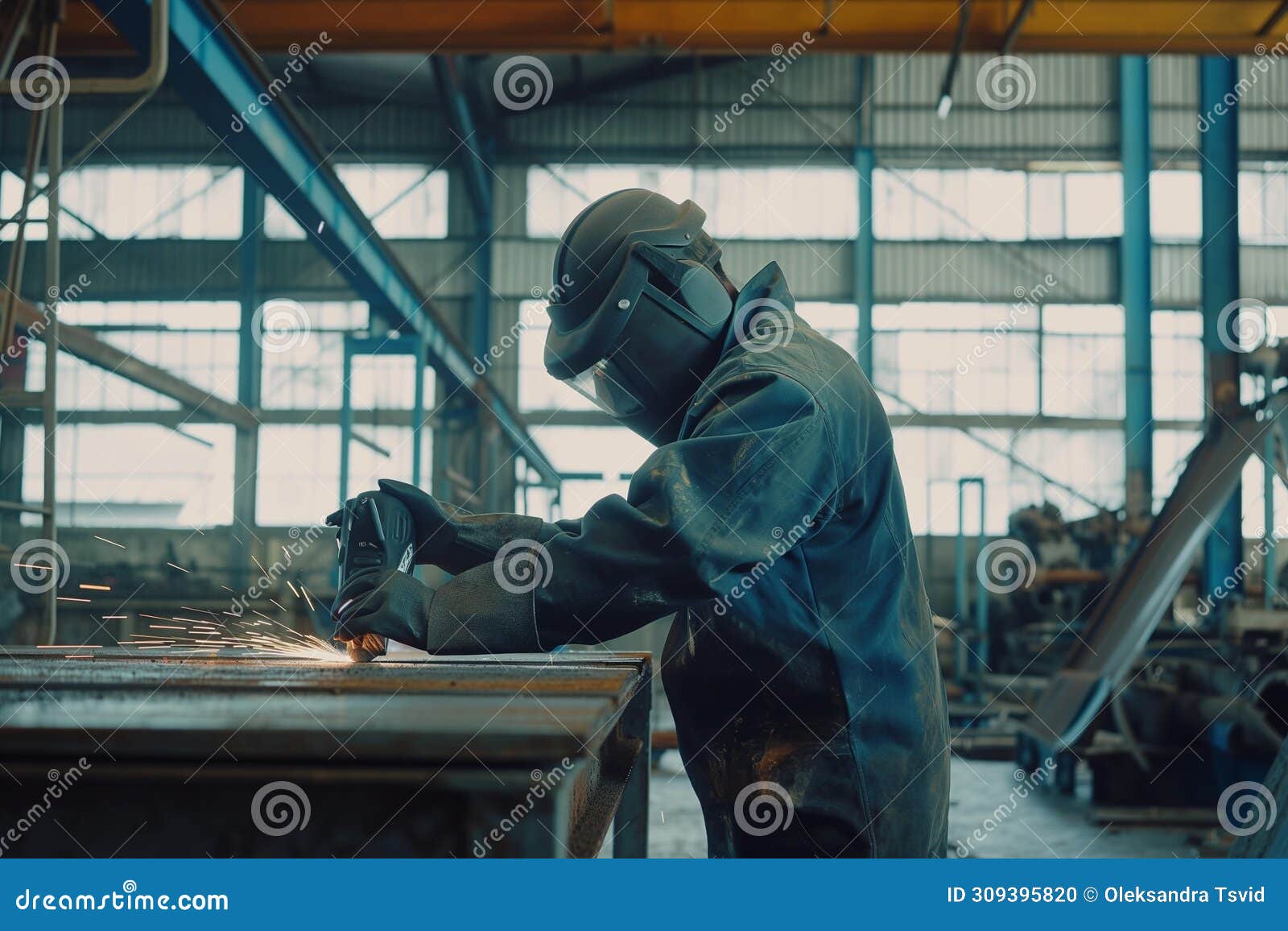 Industrial Worker Using Angle Grinder and Cutting Metal Pipe ...