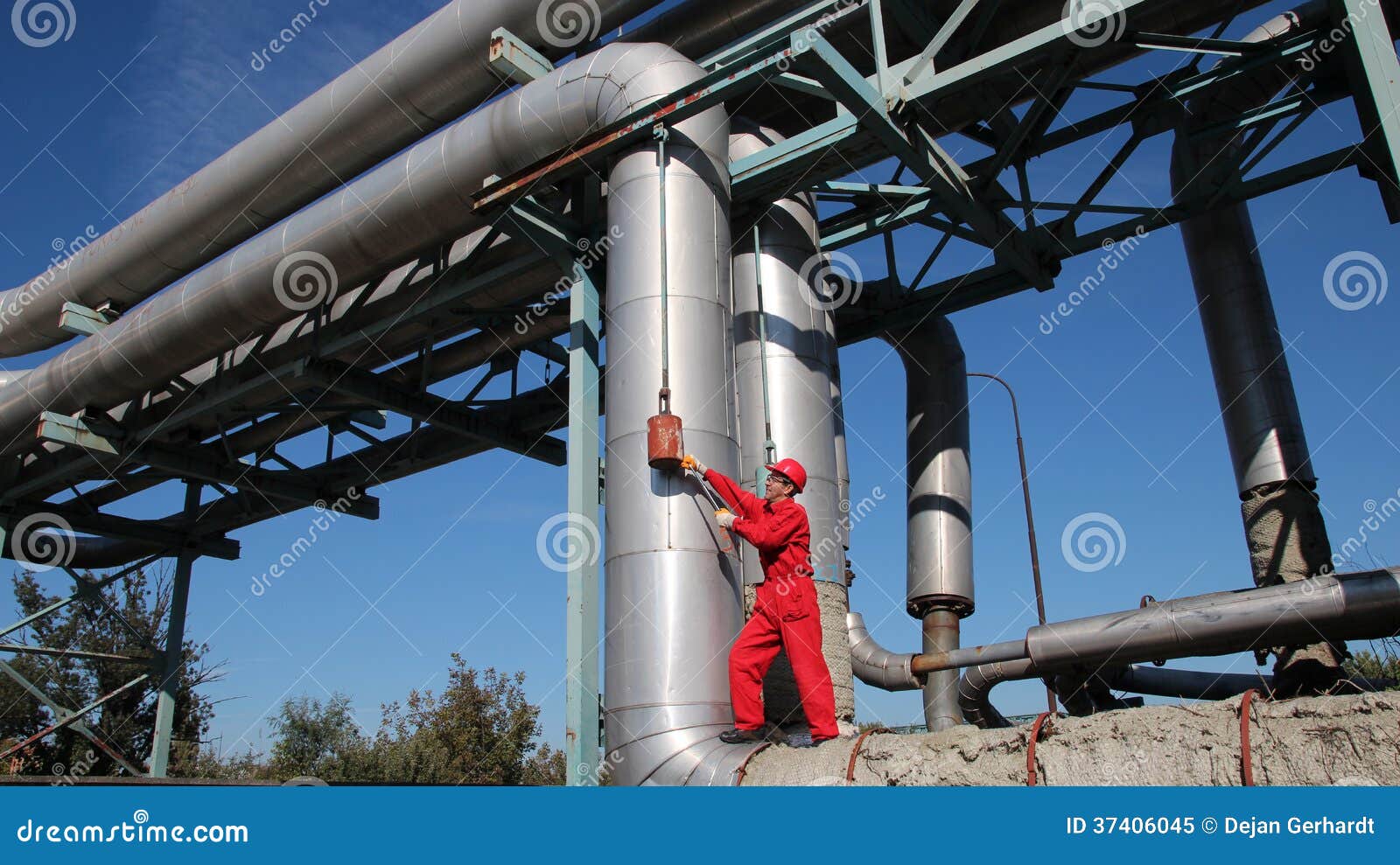 Industrial Worker Using Hand Tool in a Factory. Stock Image - Image of ...