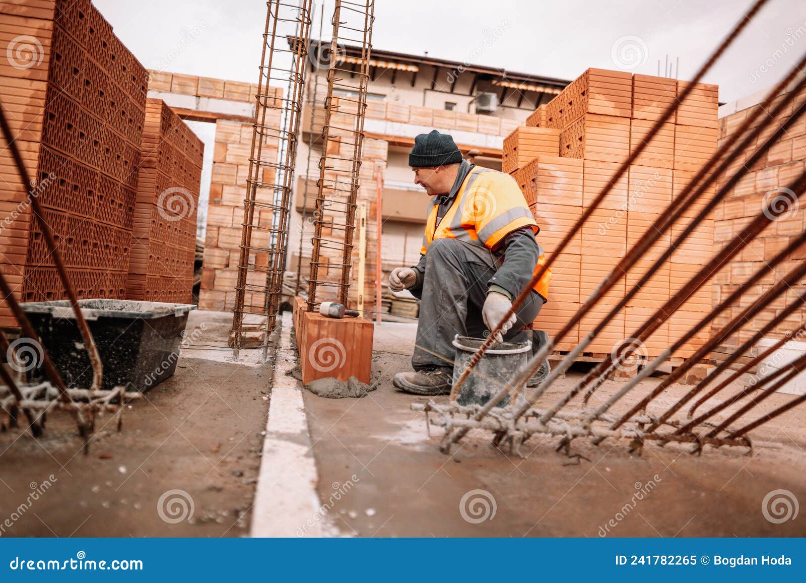 Industrial Worker Using Trowel and Tools for Building Exterior Walls ...