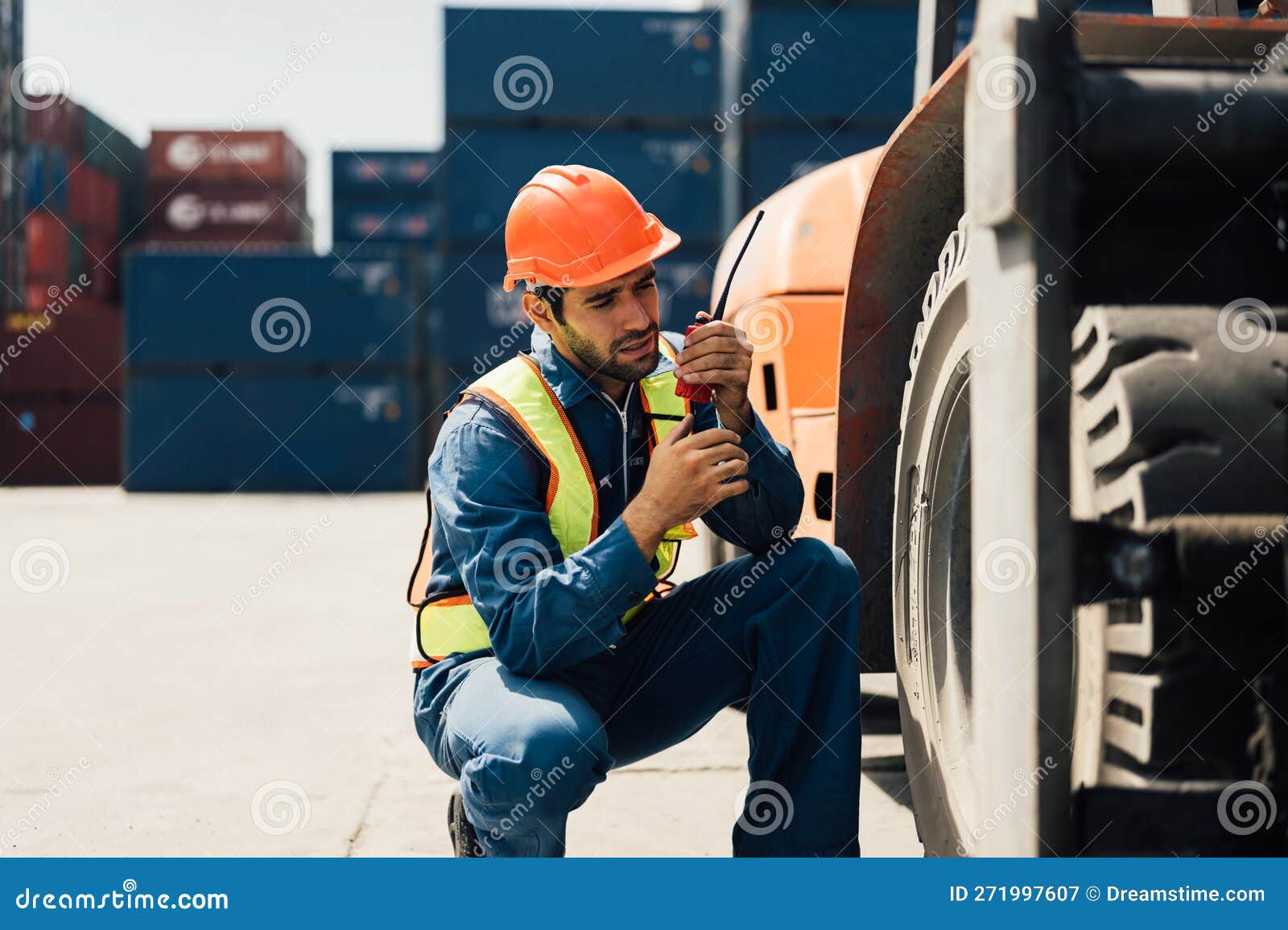Industrial Worker with Walkie-talkie Checking in Cargo Freight Ship ...