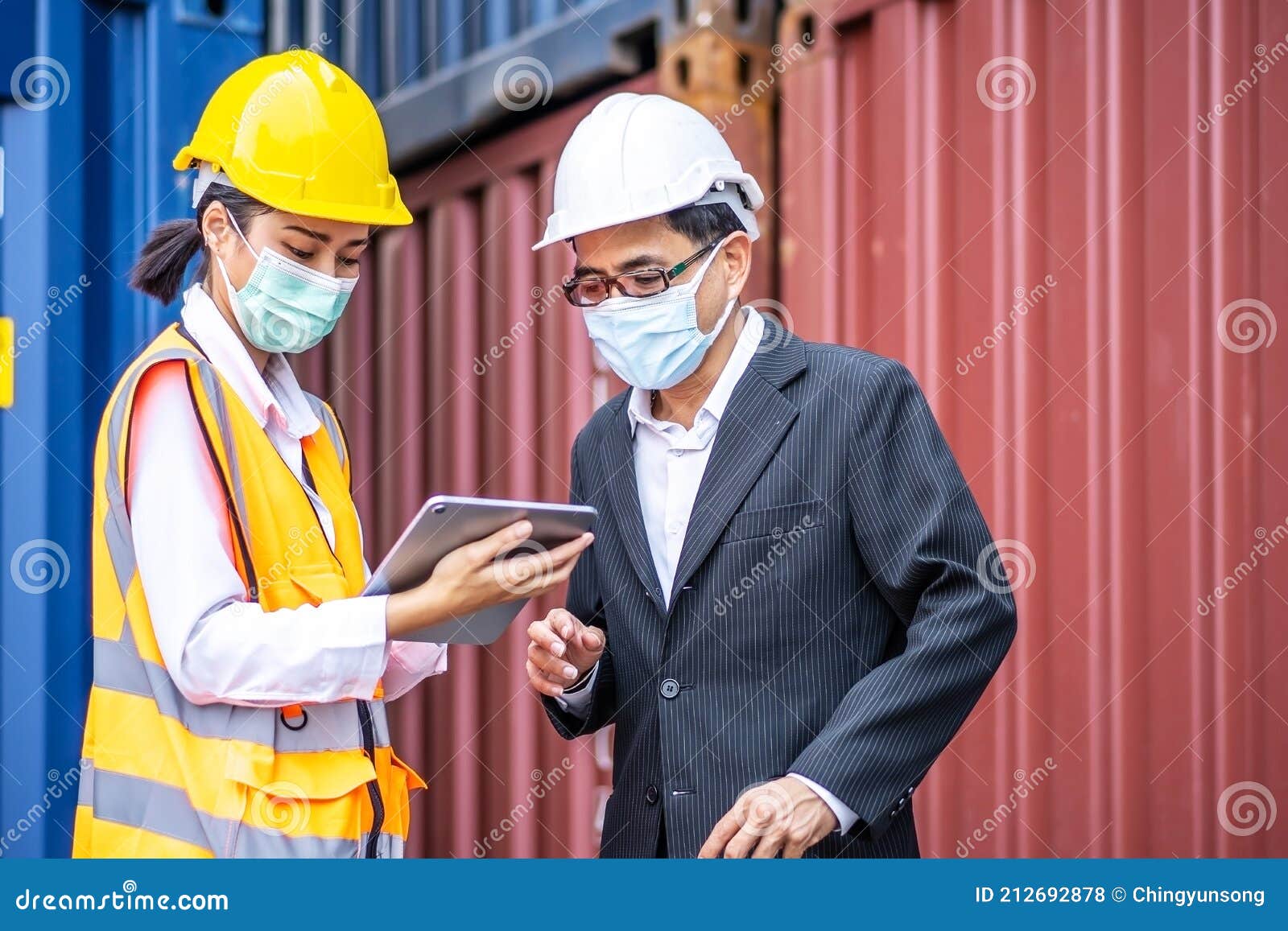 Industrial Worker Woman and Engineer Control Worker Using Tablet Device ...